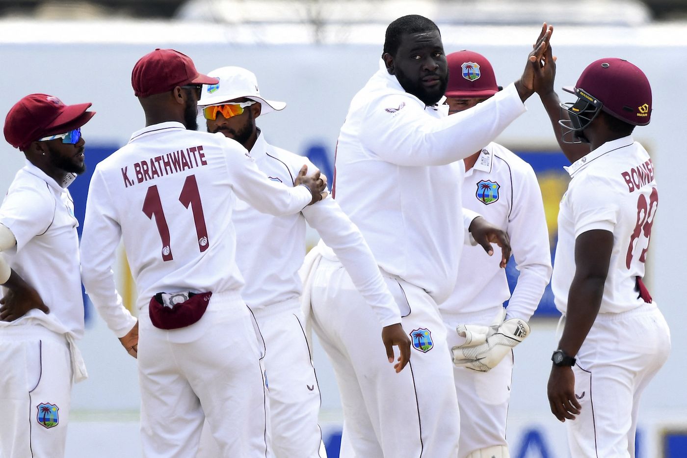 Rahkeem Cornwall celebrates with team-mates after striking early ...