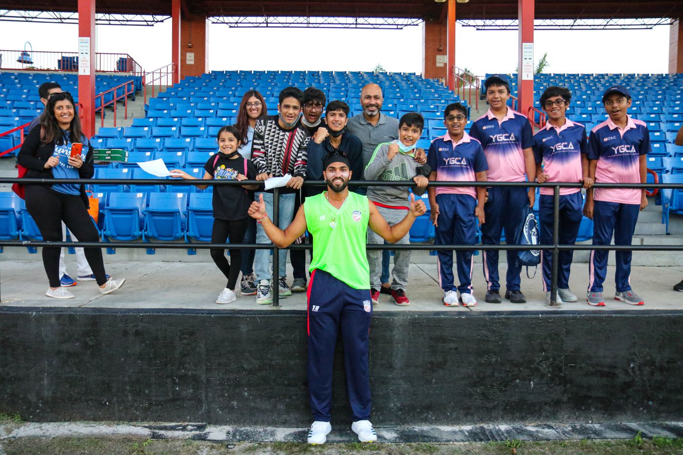 USA player Jessy Singh poses for pictures with fans after the win over ...