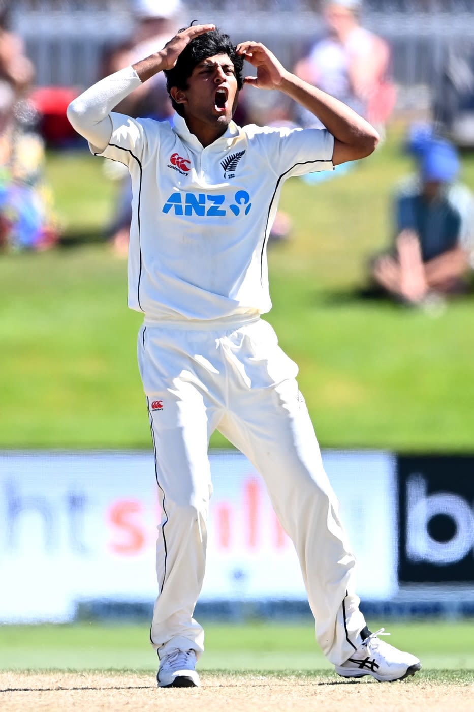 Rachin Ravindra reacts in the middle | ESPNcricinfo.com