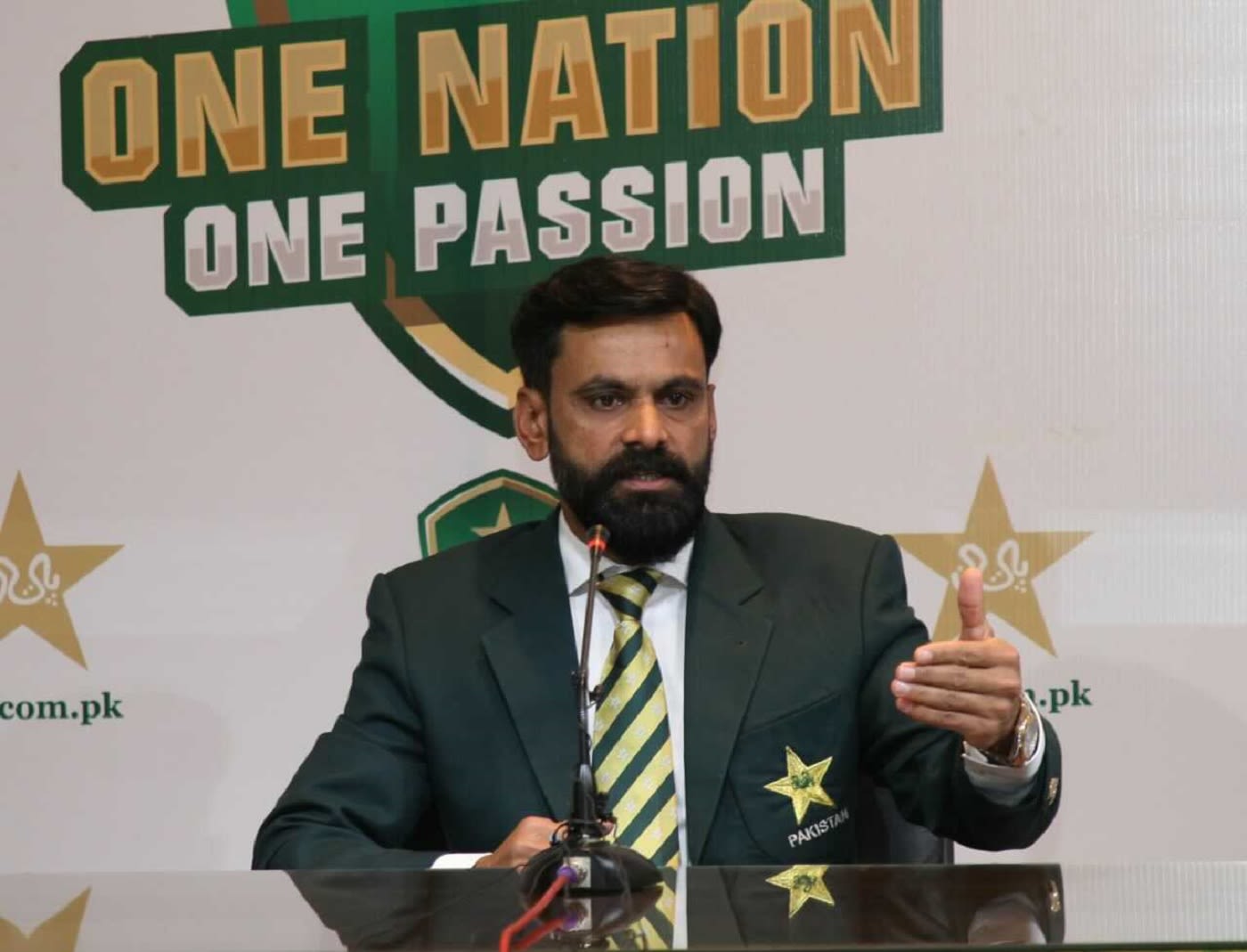 Mohammad Hafeez speaks to the media while announcing his international ...