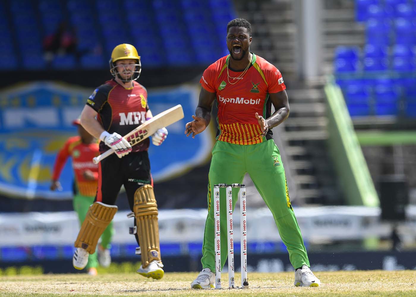 Romario Shepherd celebrates a wicket | ESPNcricinfo.com