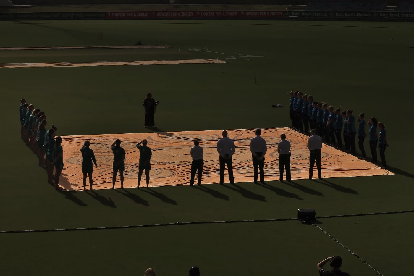 The England players, Australia players and umpires attend the barefoot ...