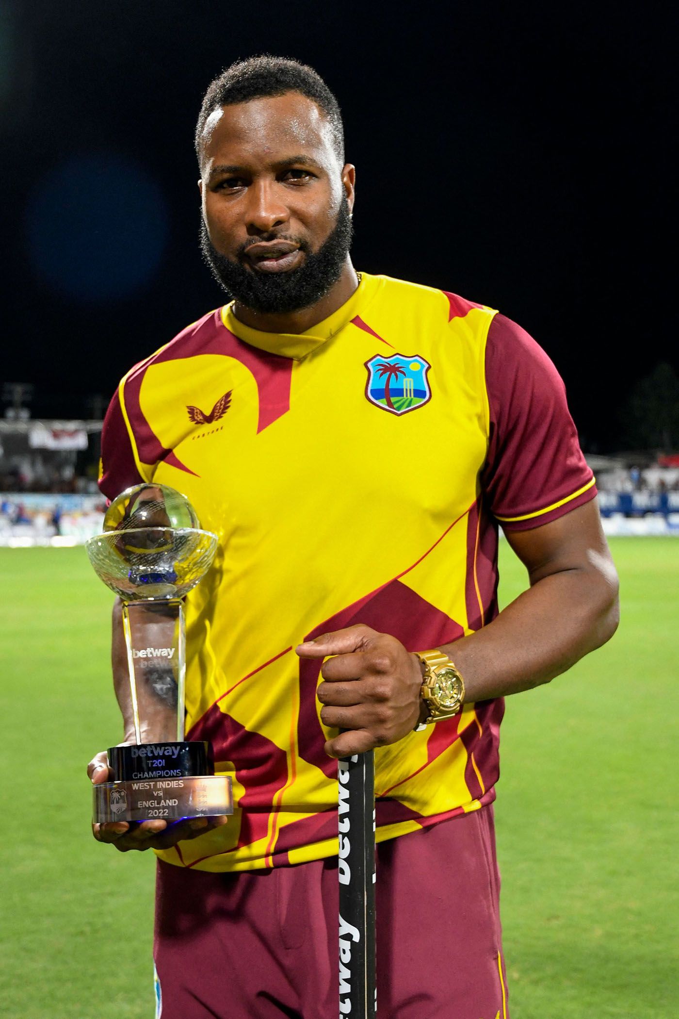 Kieron Pollard poses with the series trophy | ESPNcricinfo.com