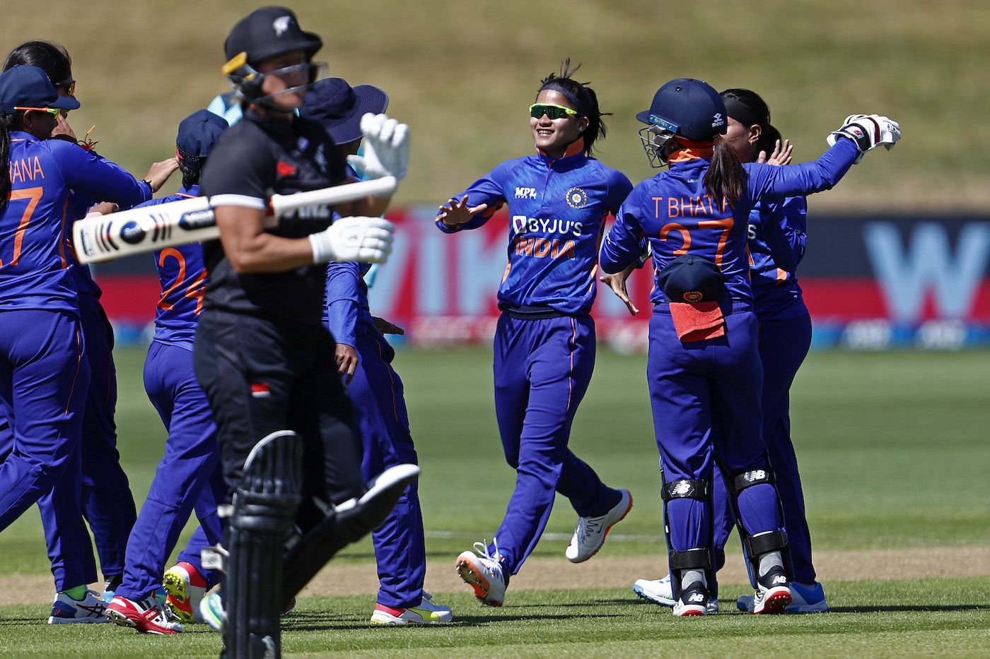 Simran Bahadur runs in to celebrate the dismissal of Sophie Devine ...