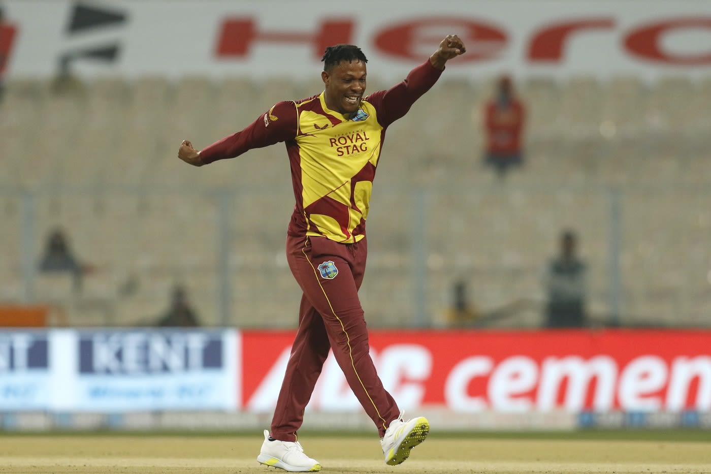 Sheldon Cottrell celebrates the wicket of Ishan KIshan | ESPNcricinfo.com