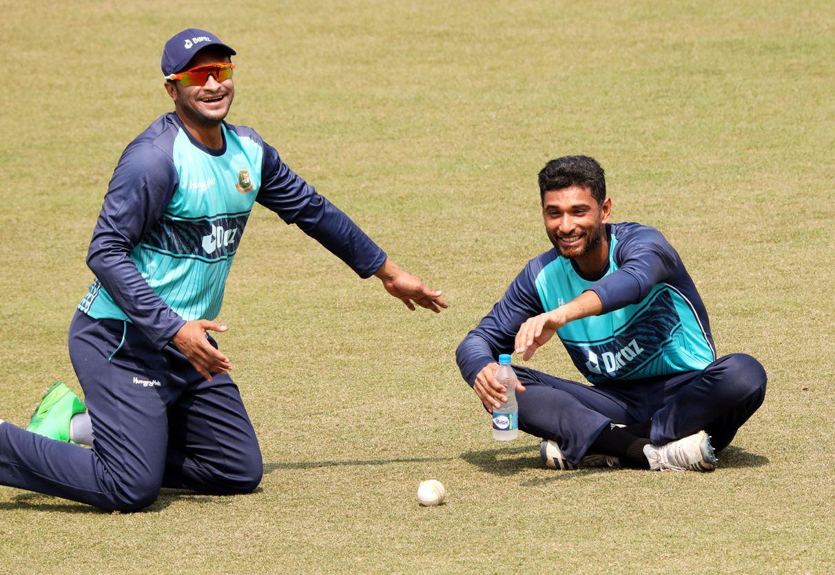 Shakib Al Hasan and Mahmudullah share a laugh during a training session ...