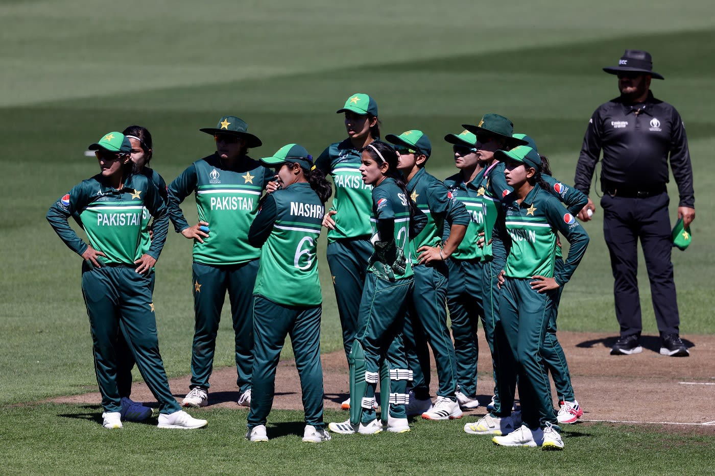 Pakistan players await the third umpire's decision | ESPNcricinfo.com