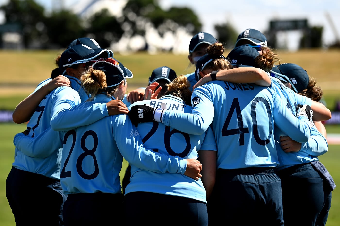 England players are in a huddle before the start of the match ...