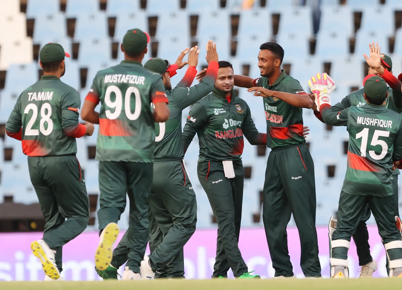 Shoriful Islam celebrates with team-mates after removing Janneman Malan ...