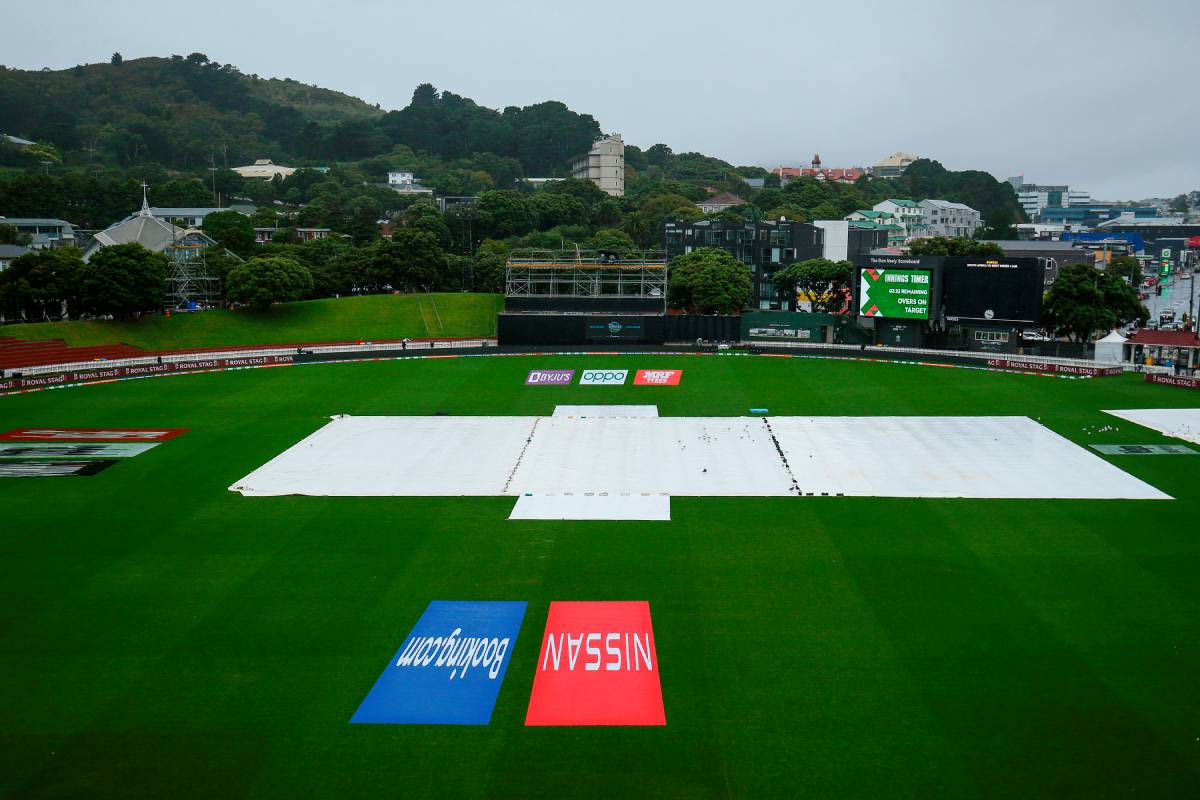 The Basin Reserve under covers following heavy morning showers ...