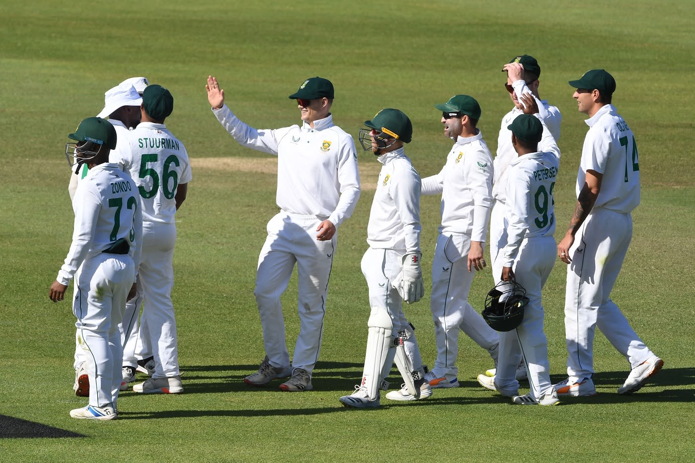 The South African fielders celebrate the fall of a wicket ...
