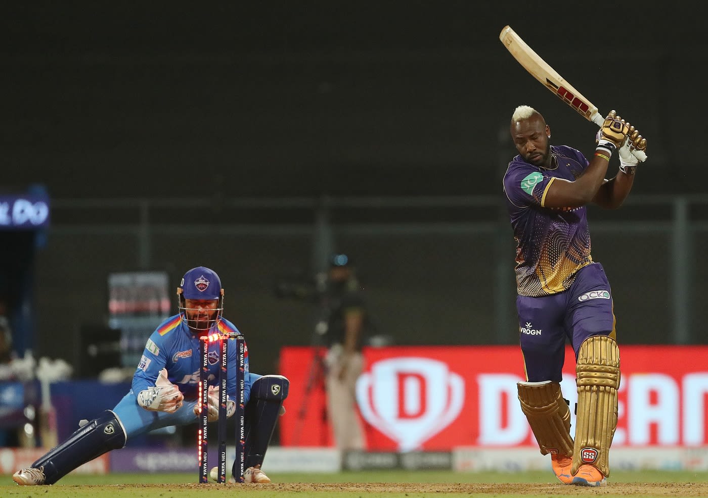 Andre Russell is stumped by Rishabh Pant off Kuldeep Yadav ... Andre Russell is stumped by Rishabh Pant off Kuldeep Yadav ...