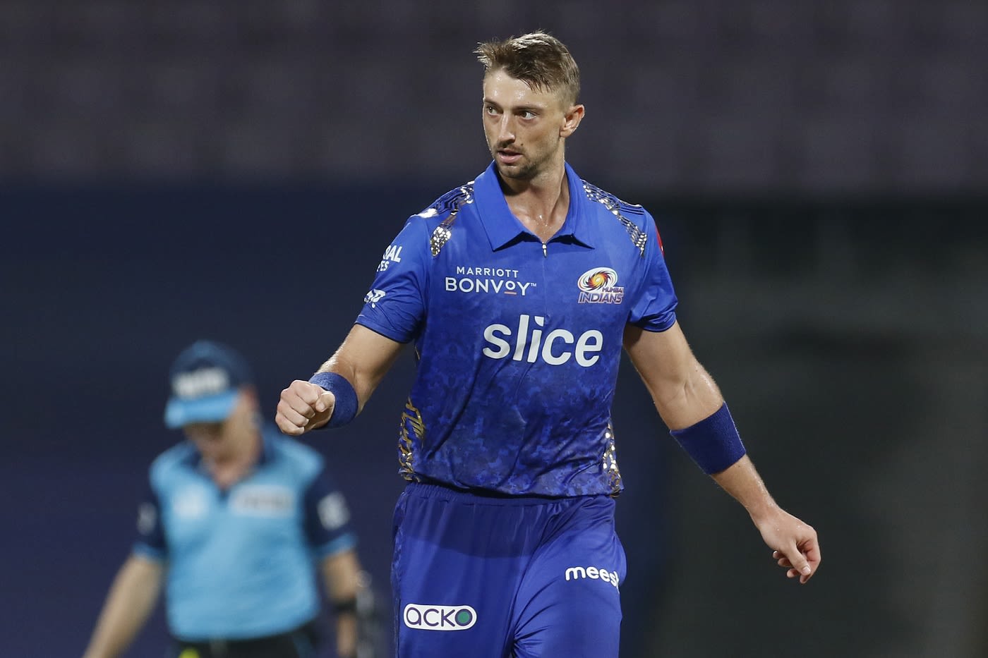 Daniel Sams celebrates after picking the wicket of Daryl Mitchell ...