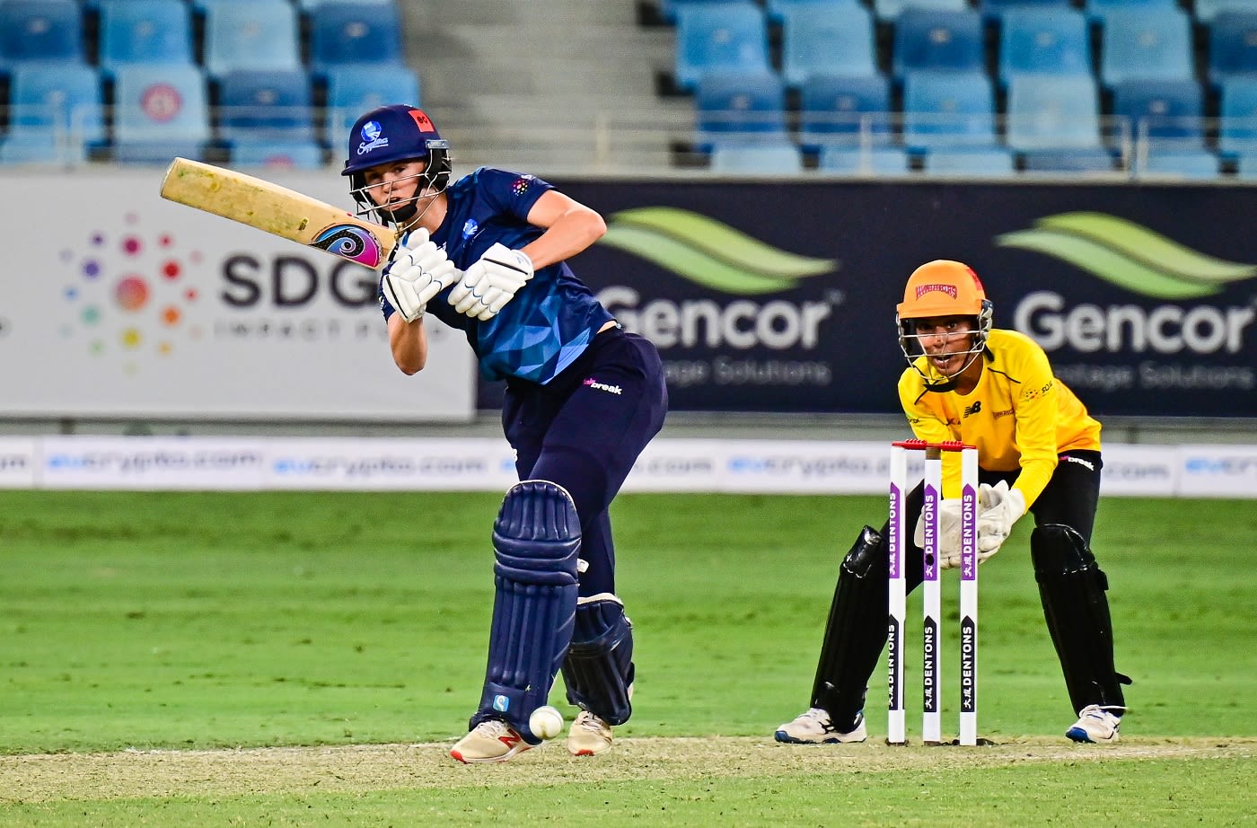 Gaby Lewis flicks one through the on side during her half-century ...