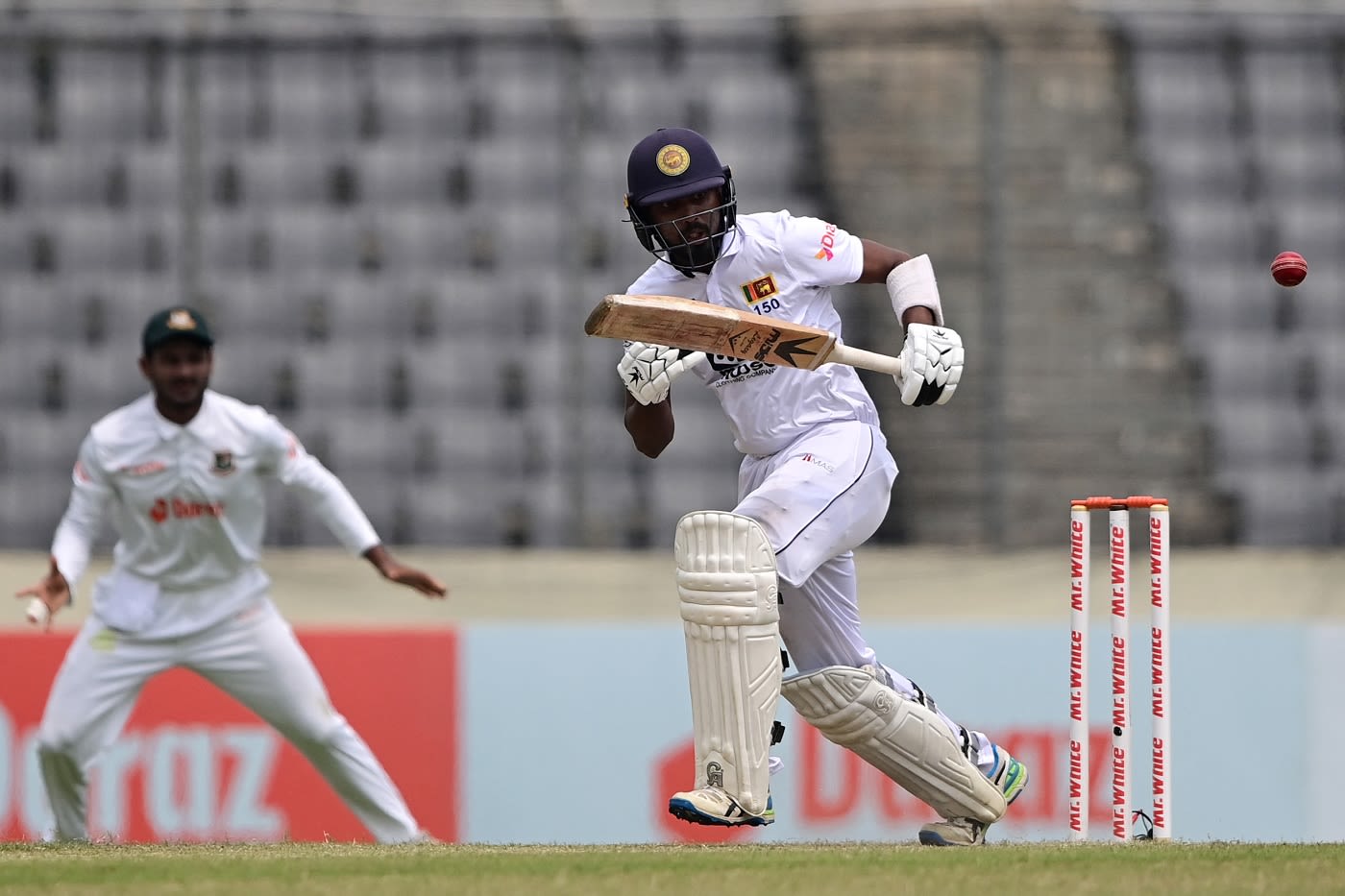 Oshada Fernando plays a ball to the on side as Sri Lanka started off ...