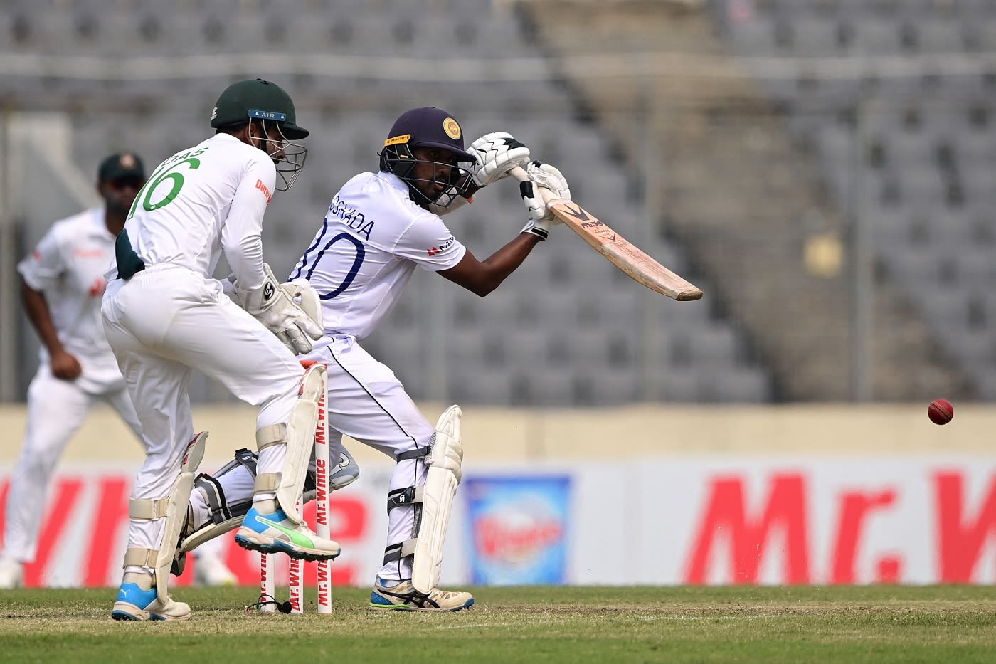 Oshada Fernando raised his half-century shortly before tea ...