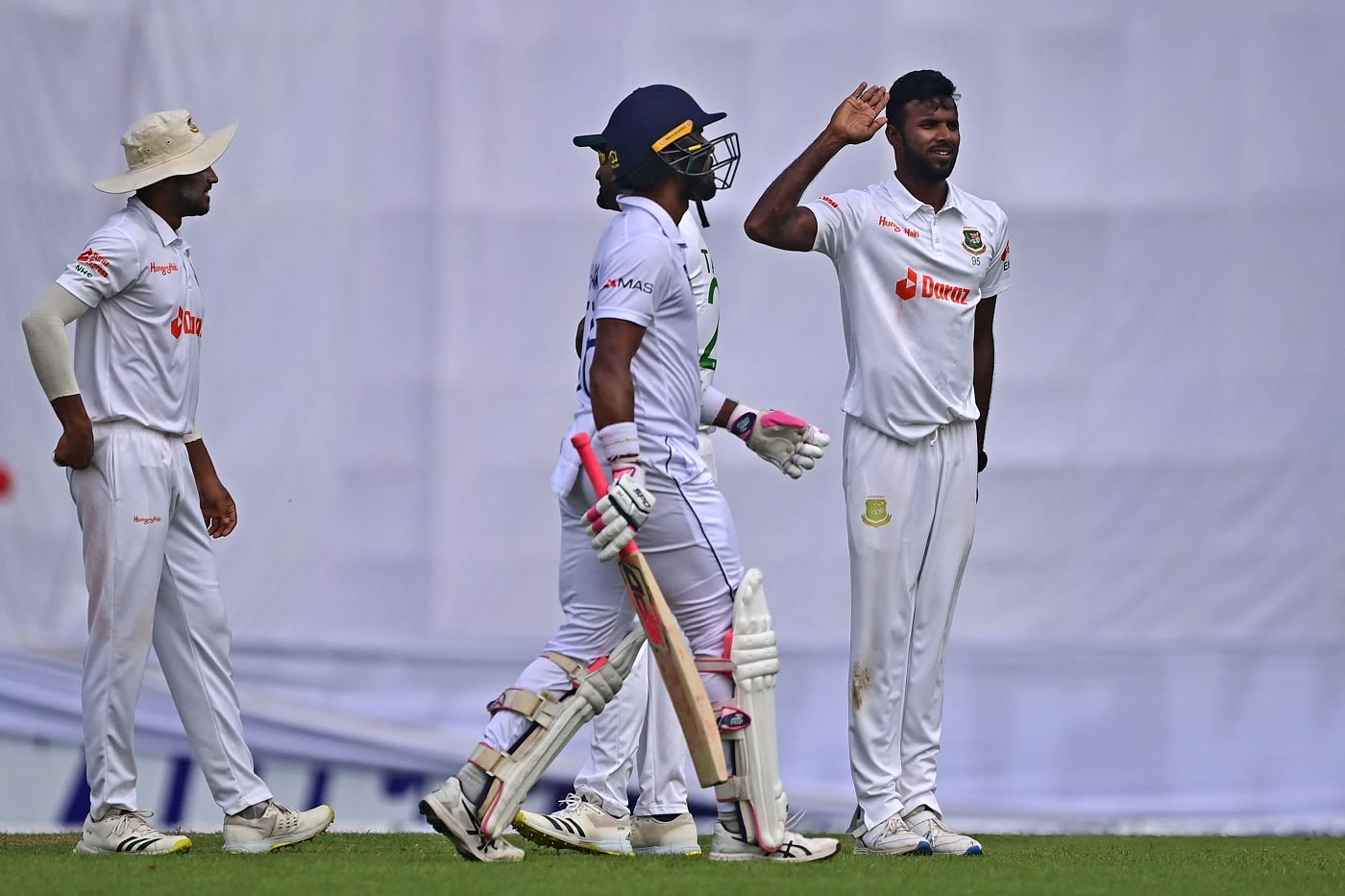 Ebadot Hossain brings out his customary celebration after getting rid ...