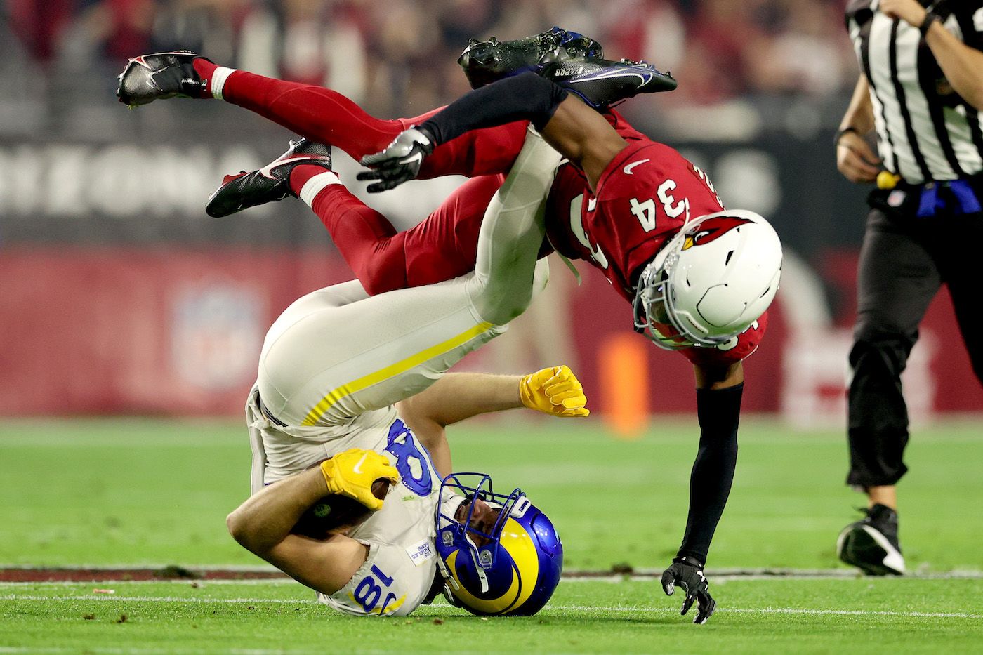 A collision between two players in an NFL game | ESPNcricinfo.com