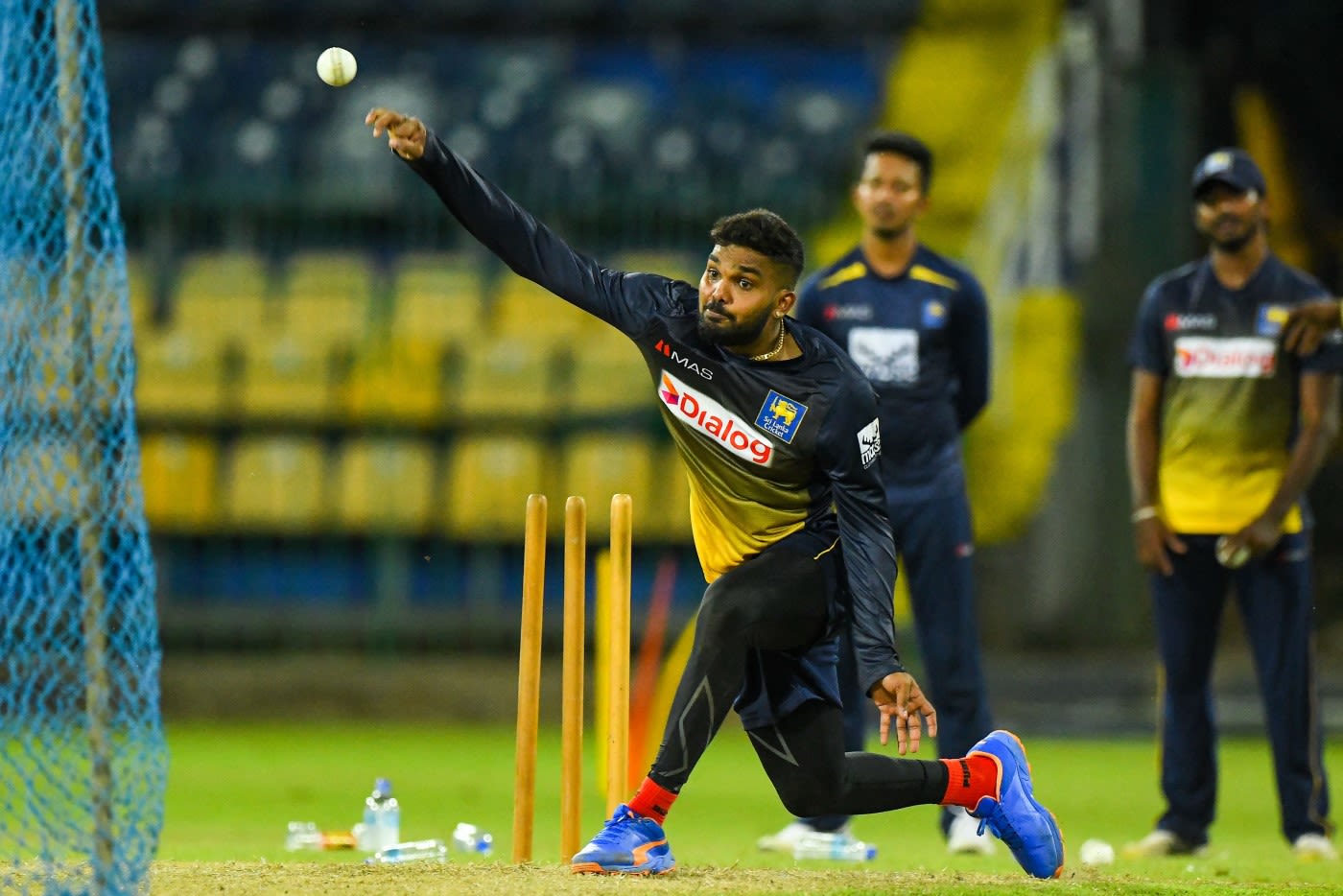 Wanindu Hasaranga uses his low-slung action during training uses his ...