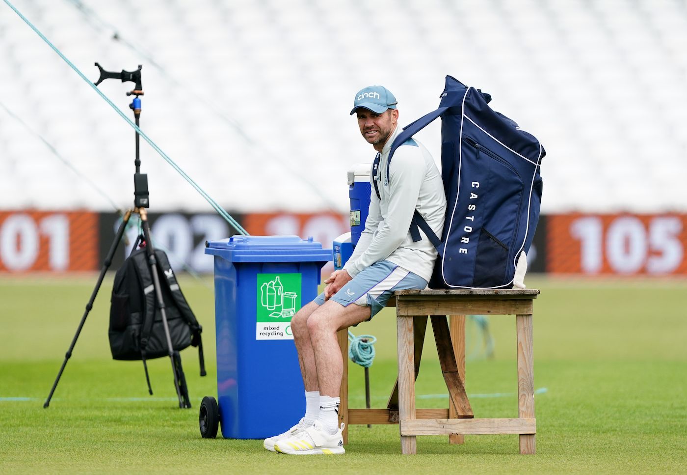 James Anderson watches a training session from the sidelines ...
