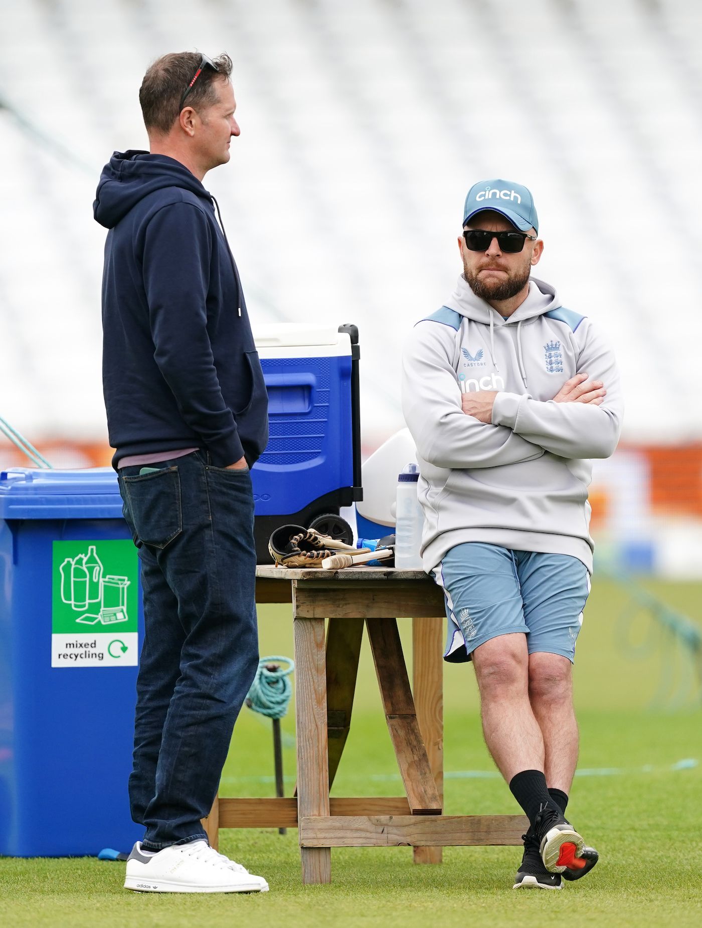 Rob Key and Brendon McCullum get together during a training session ...