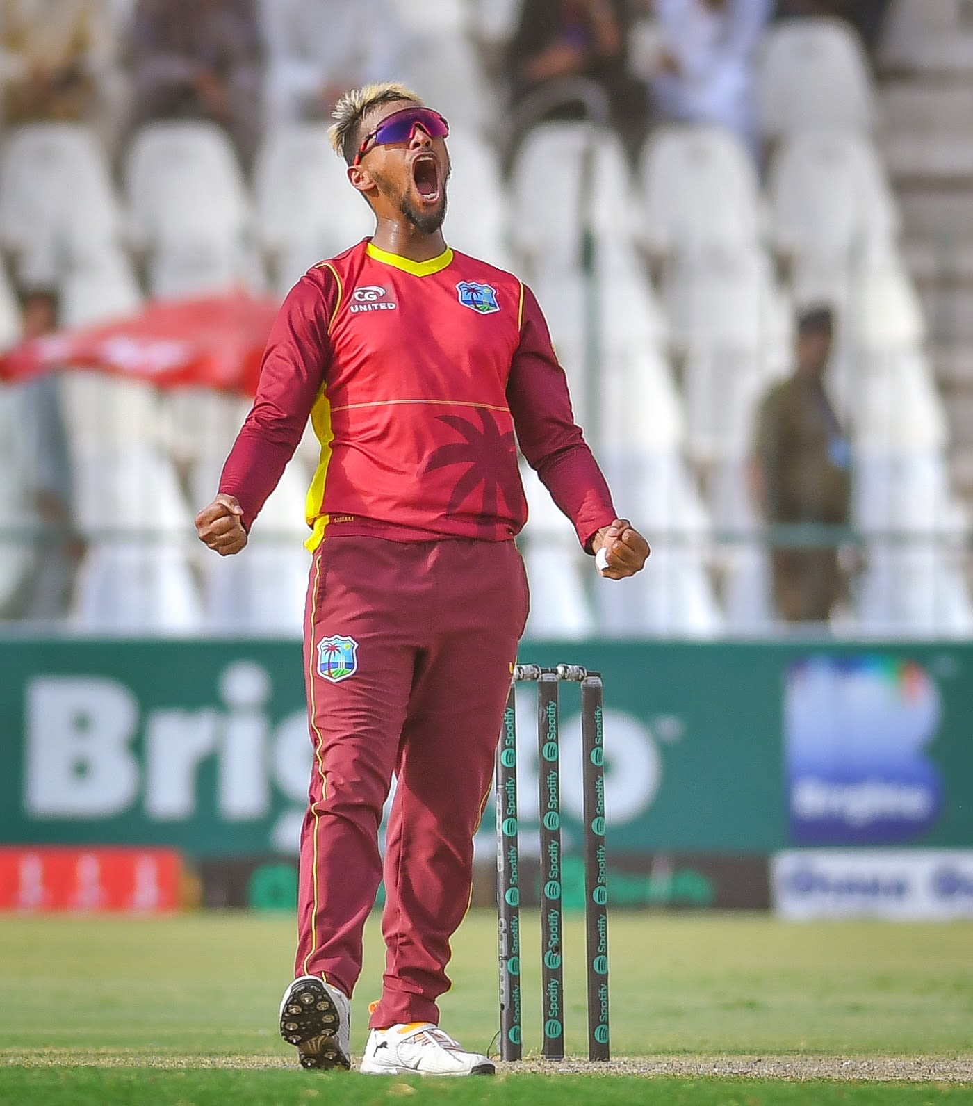 Nicholas Pooran roars after picking up his maiden international wicket ...