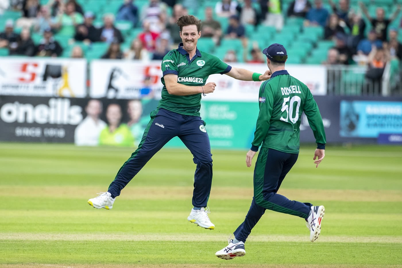 Mark Adair celebrates with George Dockrell after striking on the first ...