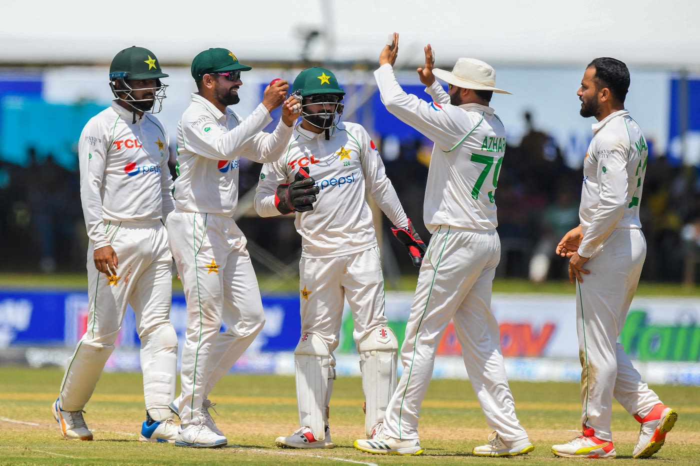 Pakistan players celebrate a wicket | ESPNcricinfo.com