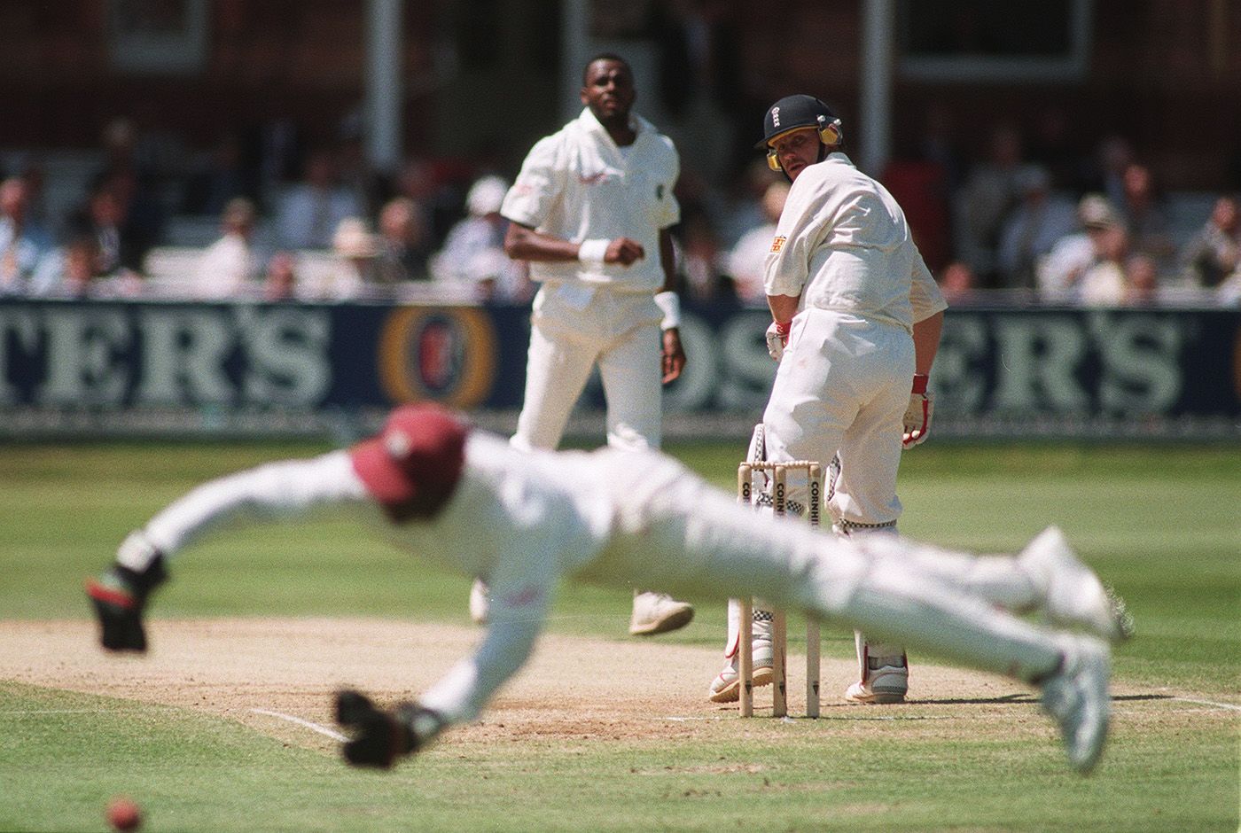 Robin Smith looks back after edging a delivery from Courtney Walsh ...