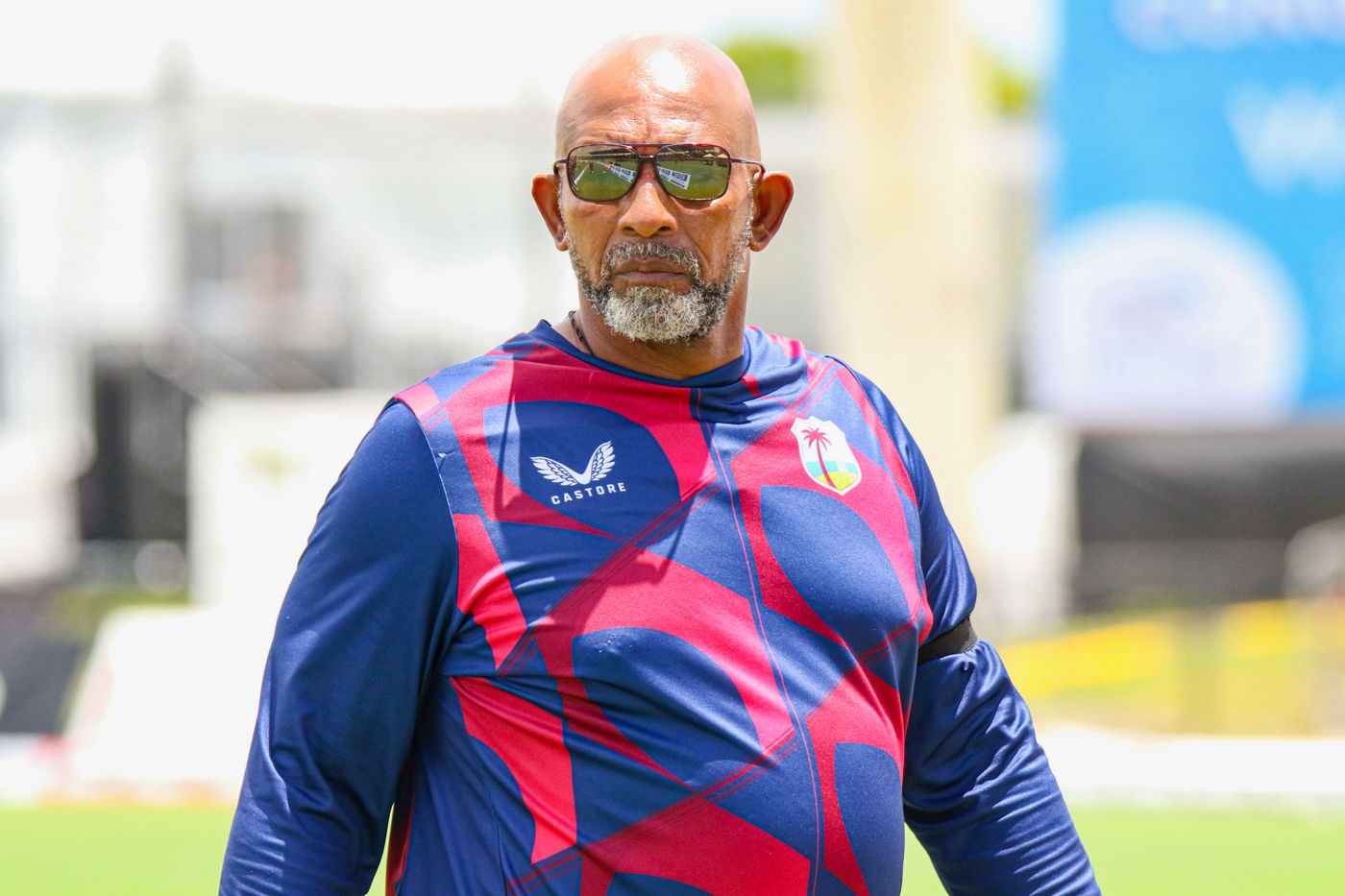 Phil Simmons walks on the outfield during the innings break ...