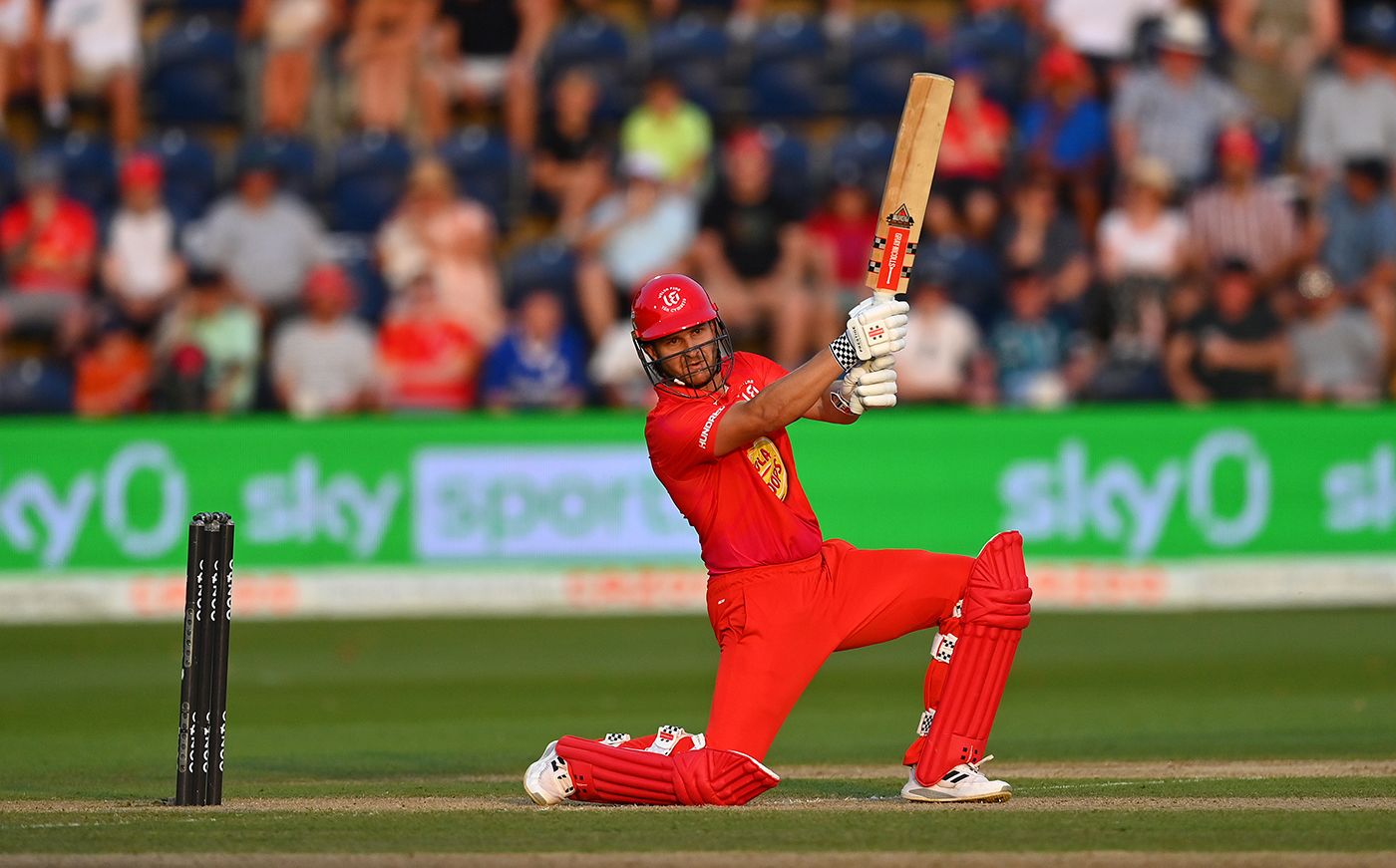 Sam Hain climbs into a shot | ESPNcricinfo.com