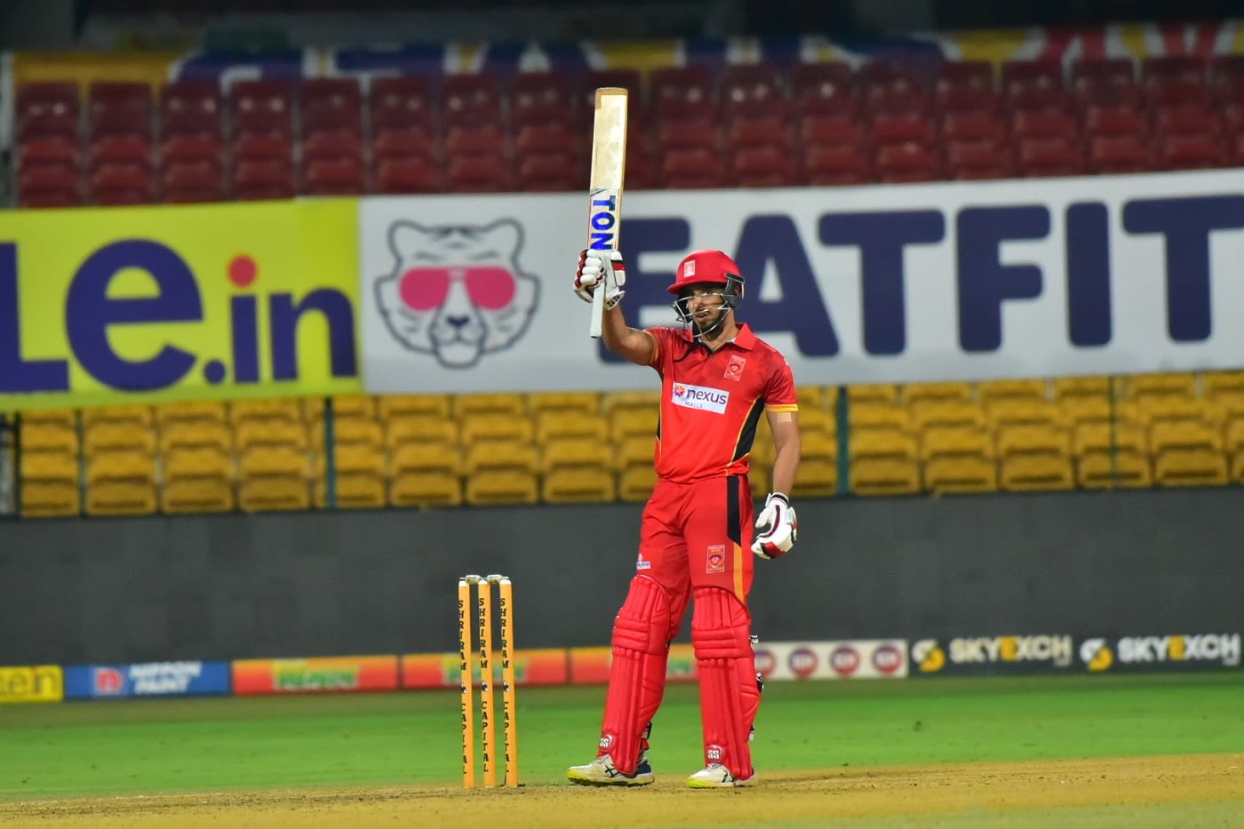 Abhinav Manohar acknowledges the applause on reaching his fifty ...