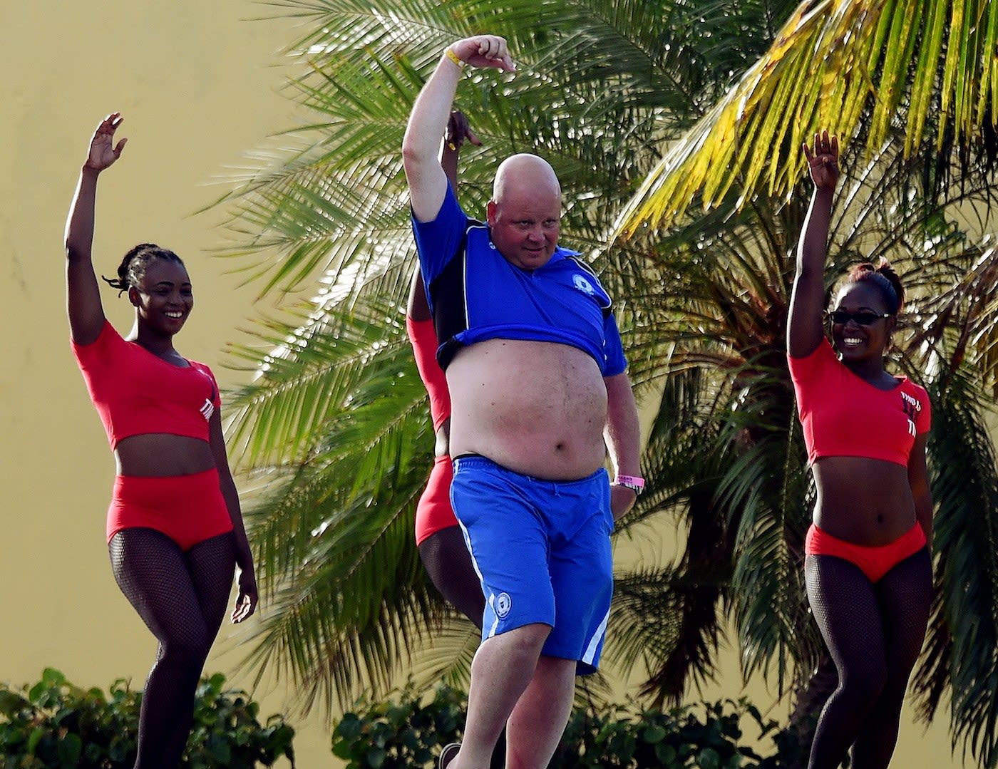 An England fan does a little dance to cheer his side on | ESPNcricinfo.com