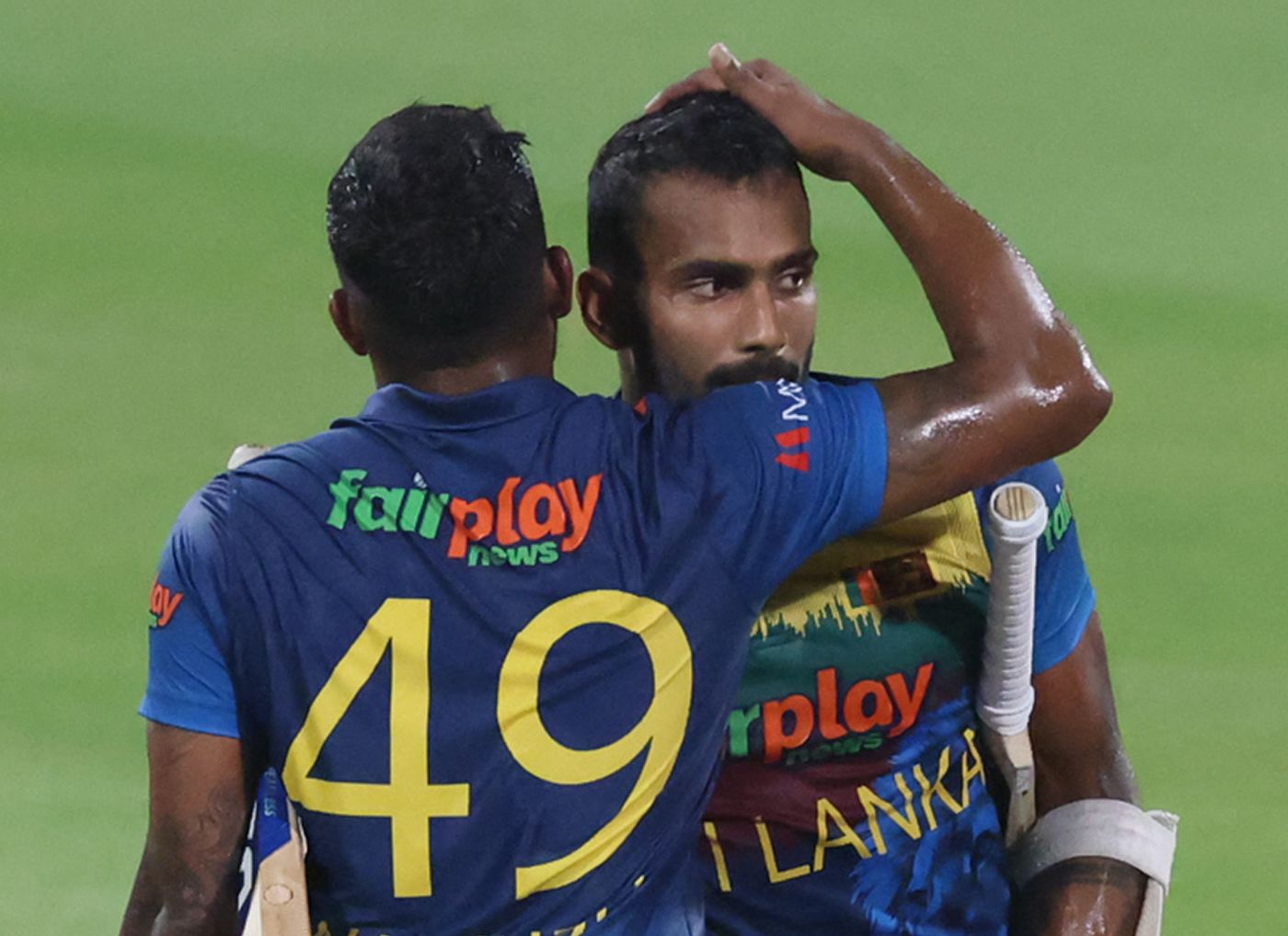 Chamika Karunaratne gets a bit of love from Wanindu Hasaranga after ...