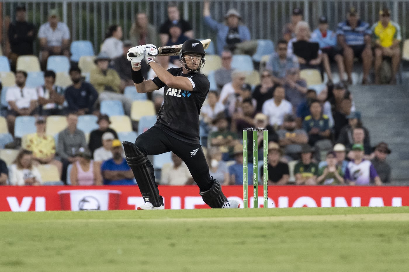 Mitchell Santner goes over the infield on the off side | ESPNcricinfo.com