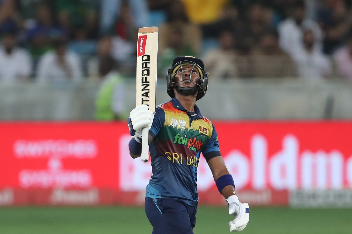 Pathum Nissanka raises his bat after recording a second successive ...