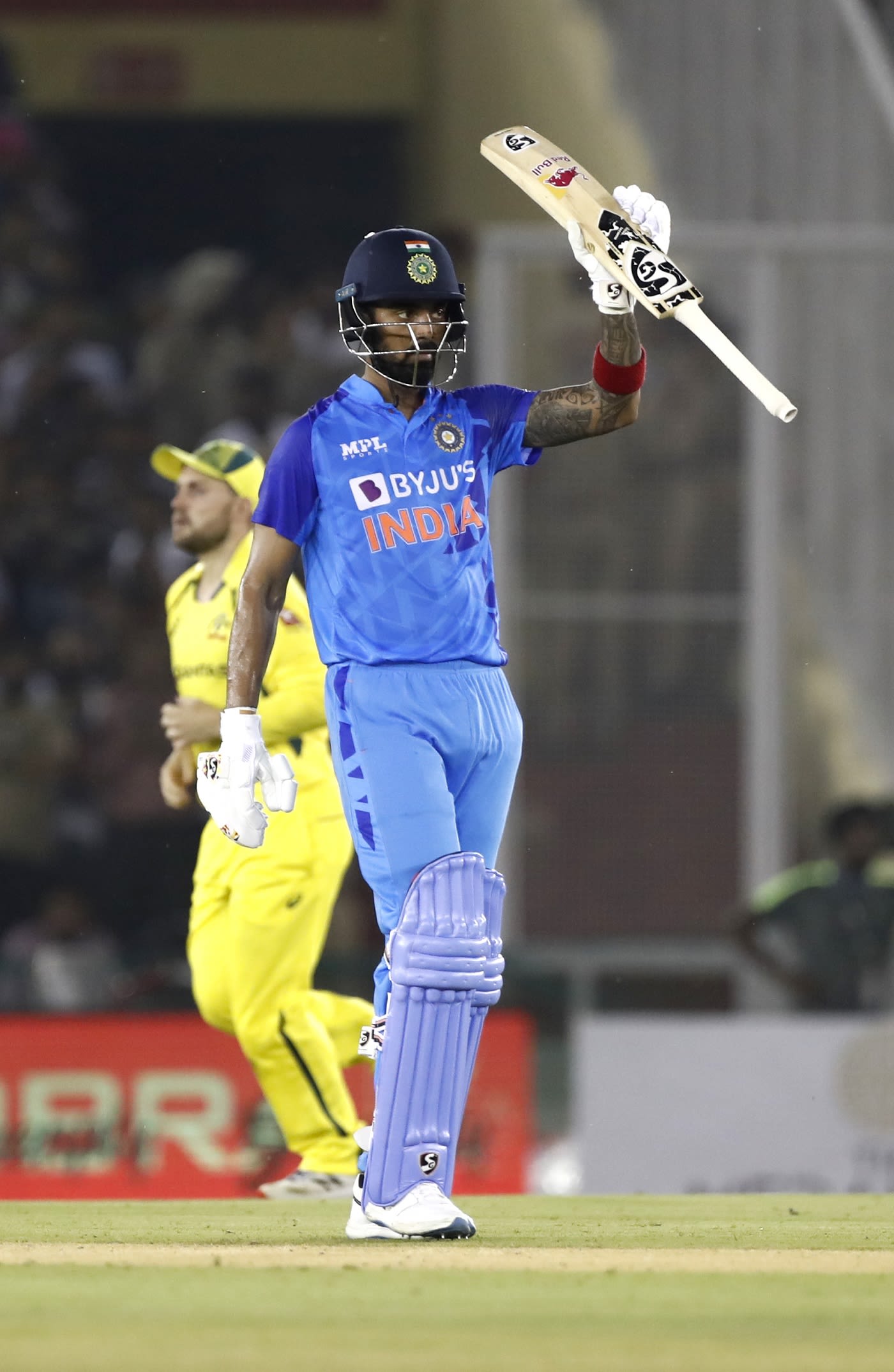 KL Rahul raises his bat after his third T20I half-century ...