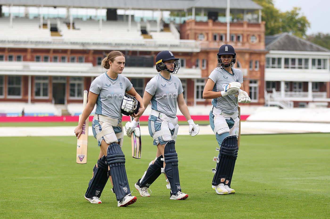 Emma Lamb, Charlie Dean and Maia Bouchier head to the nets ...