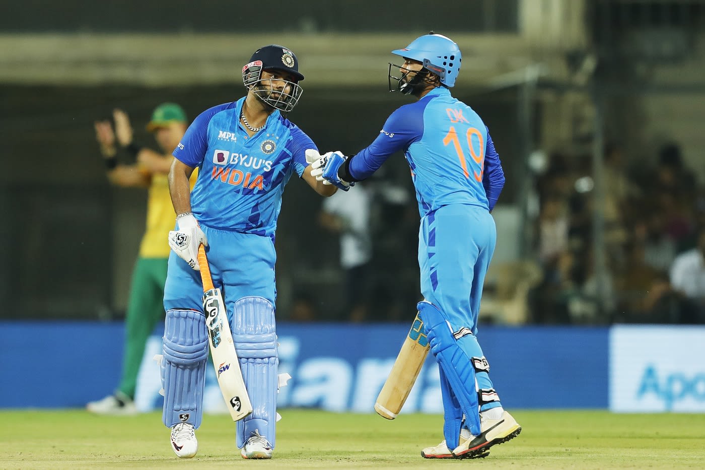 Rishabh Pant and Dinesh Karthik bump fists | ESPNcricinfo.com