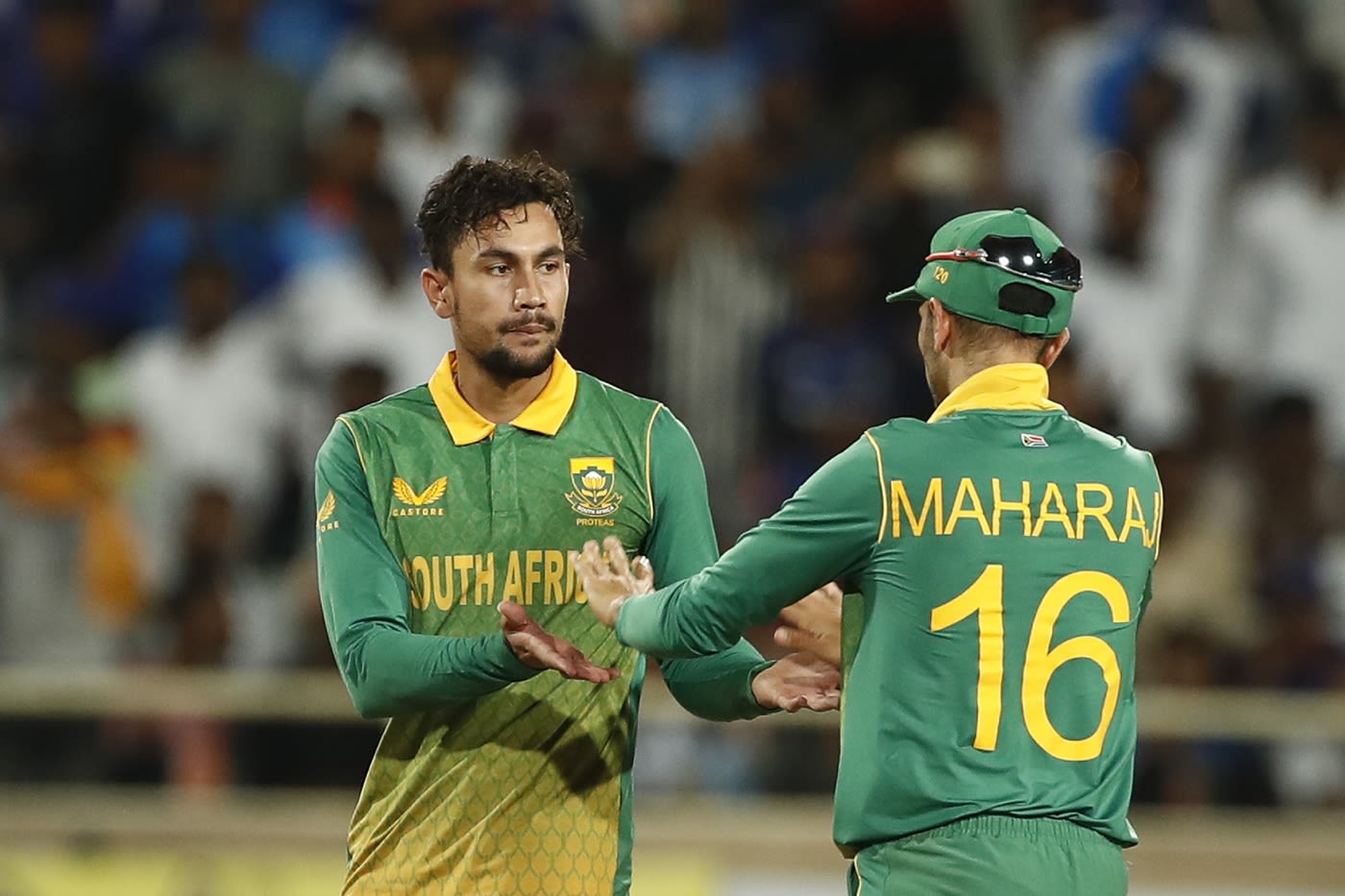Bjorn Fortuin celebrates his wicket of Ishan Kishan with Keshav Maharaj ...
