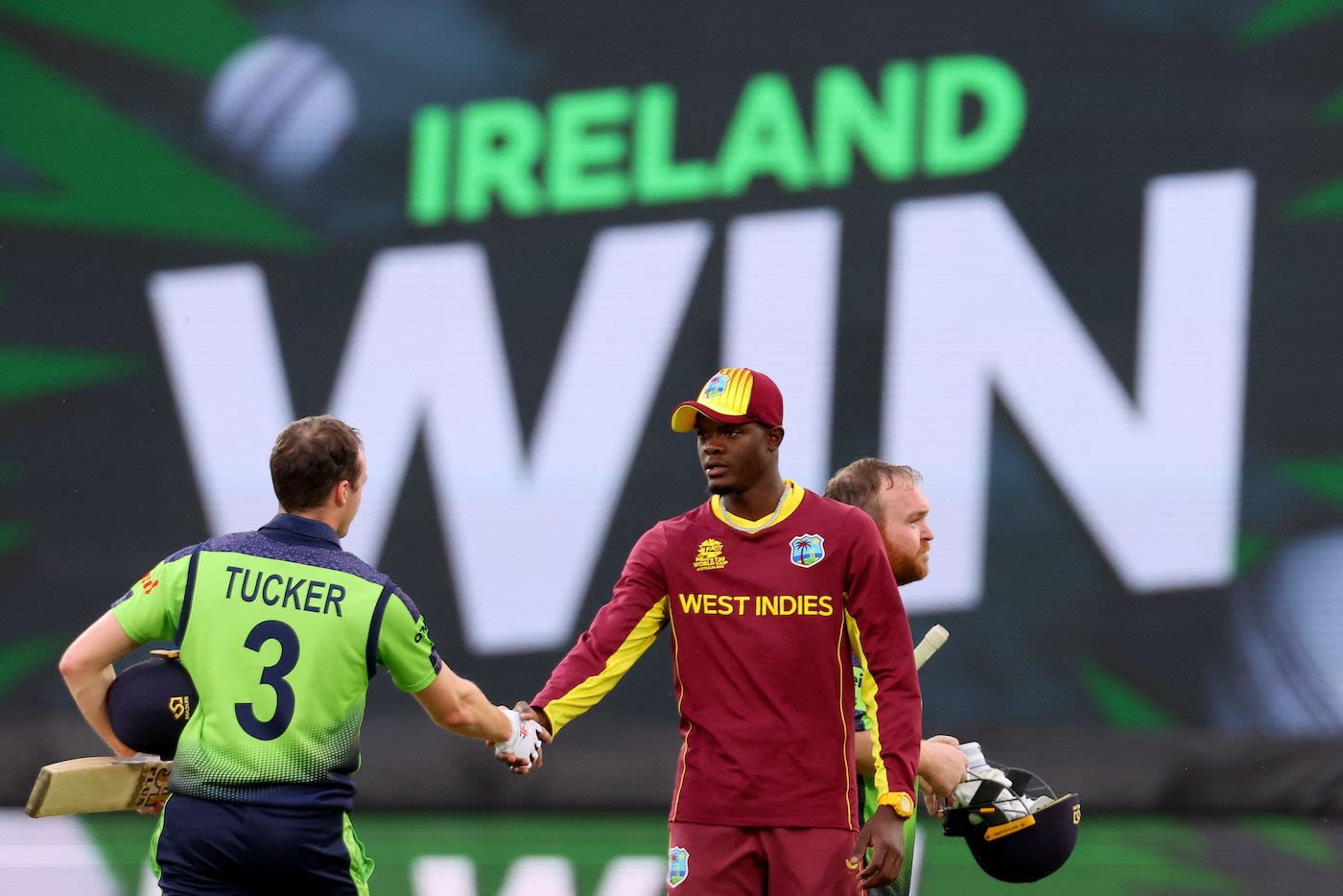 Lorcan Tucker commiserates with Alzarri Joseph after Ireland toppled ...