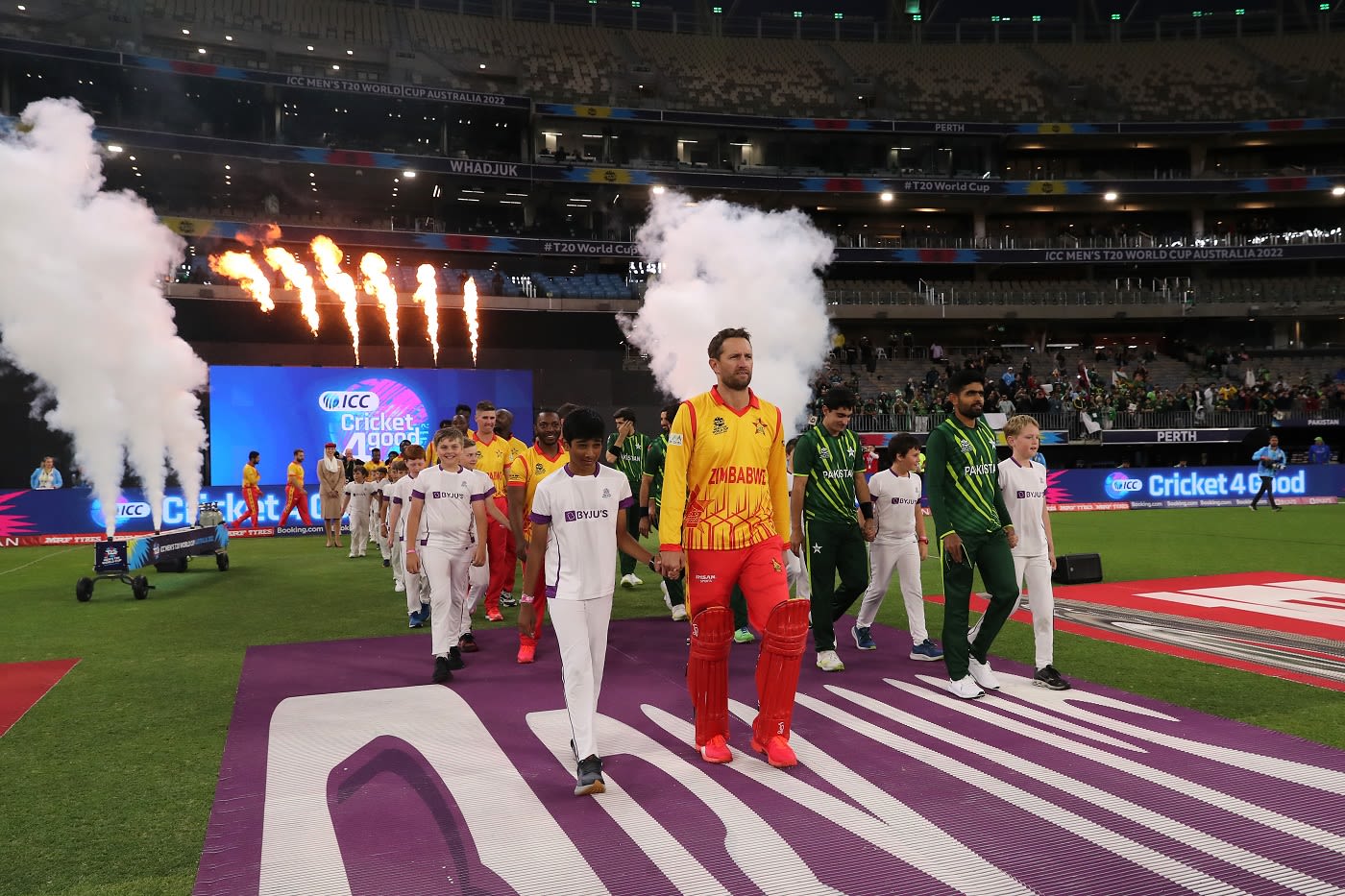 Craig Ervine and Babar Azam walk out with their two sides ...