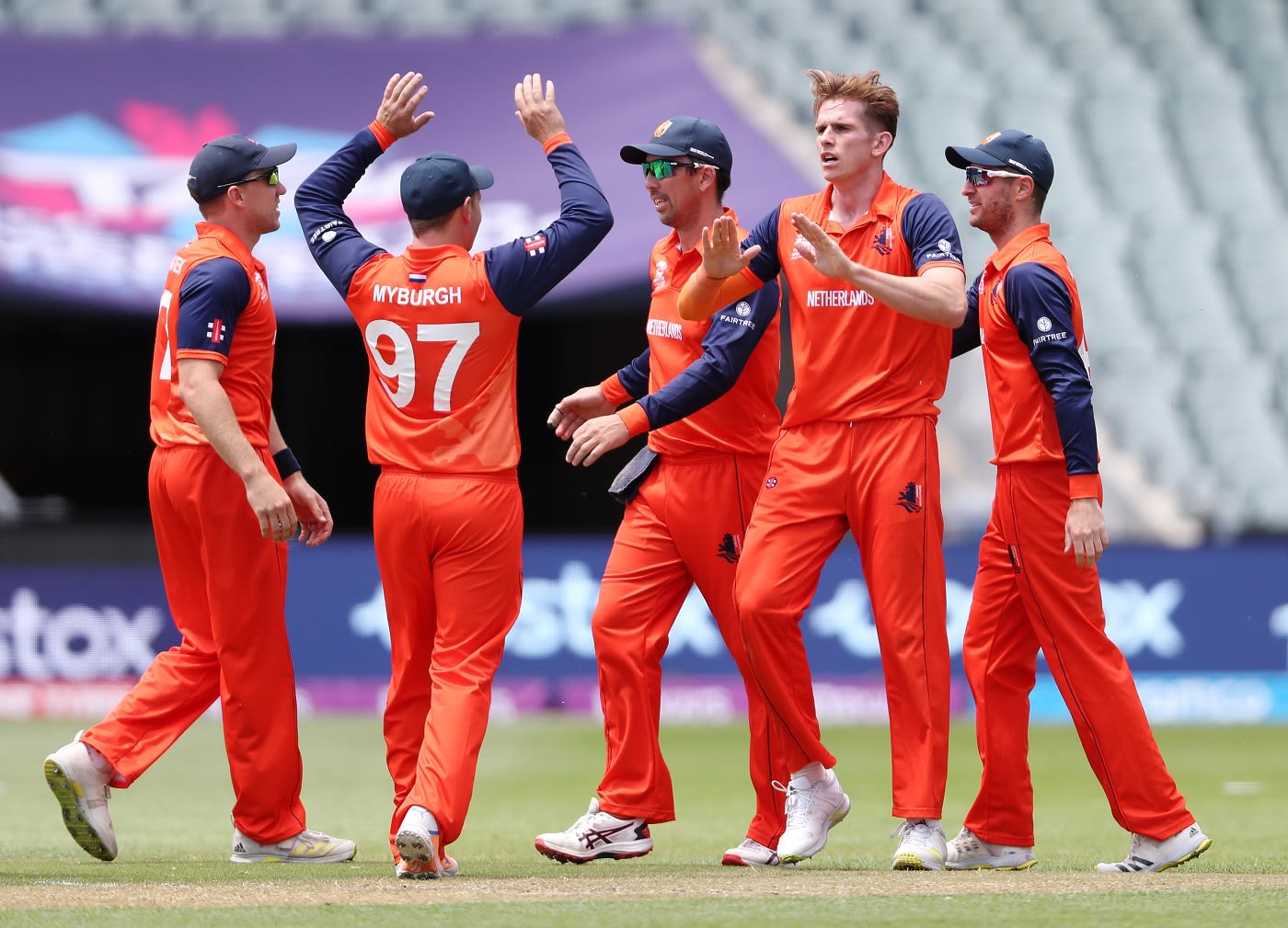 Fred Klaasen celebrates with team-mates the wicket of Quinton de Kock ...