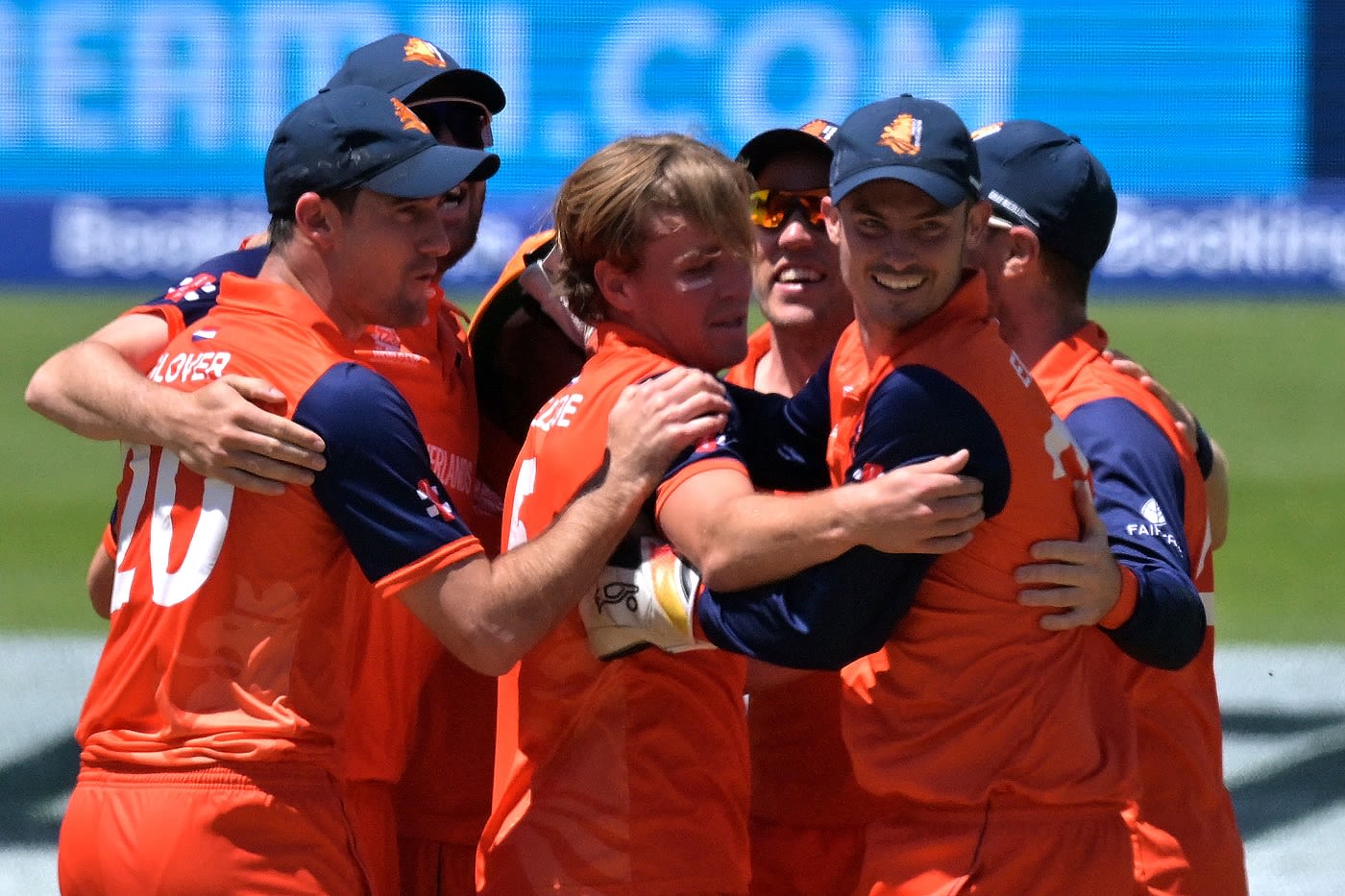 The Netherlands players celebrate their win over South Africa ...