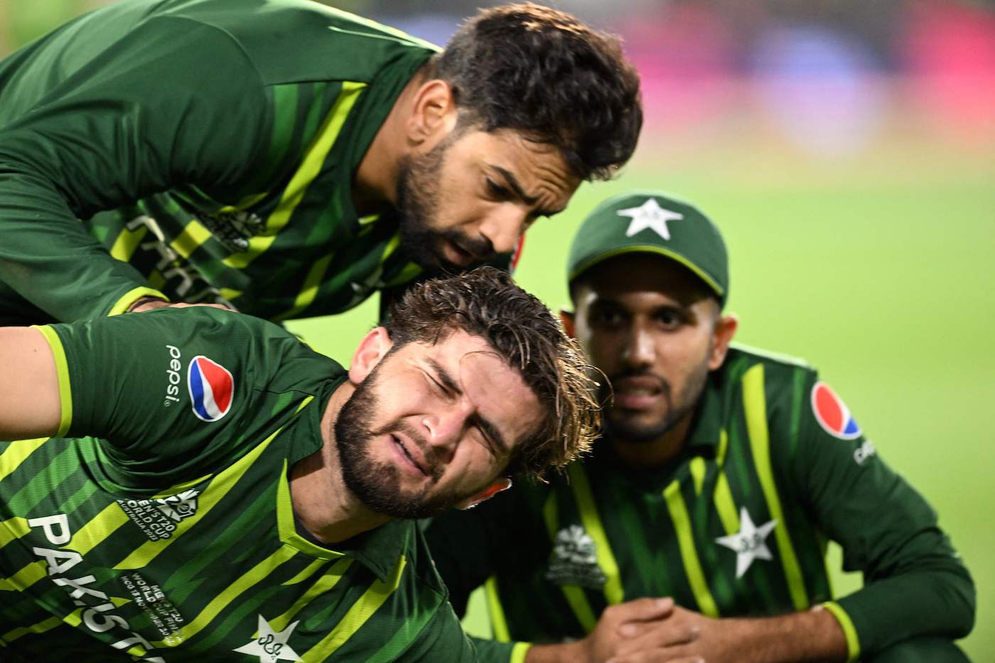 Concerned faces all around as Shaheen Afridi stays down after pulling ...