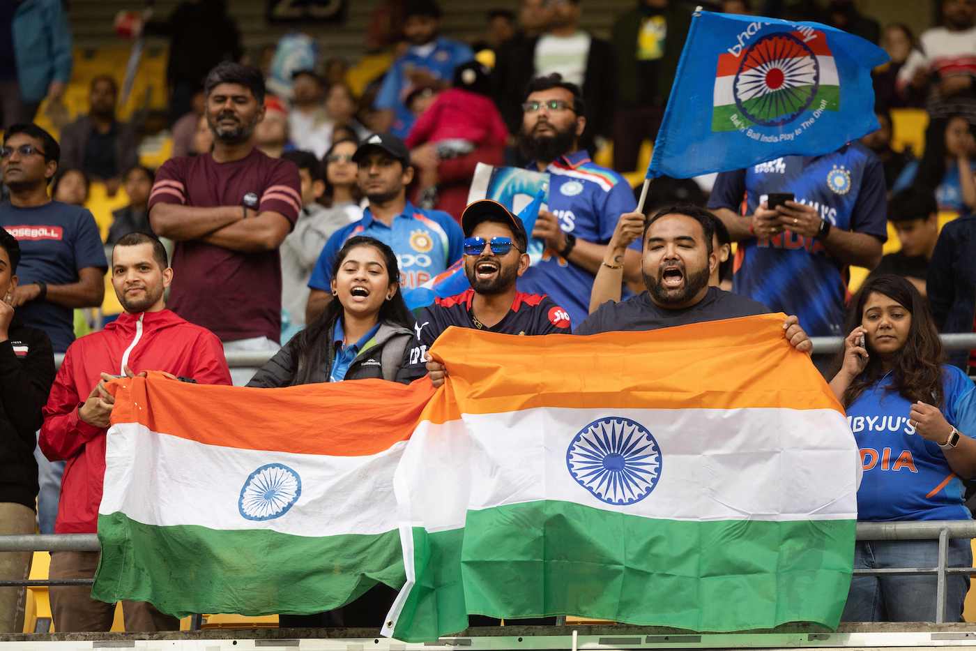 The fans - more supporting India - did turn up despite the poor weather ...