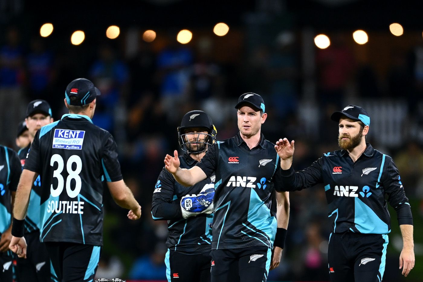 New Zealand's players celebrate after Ishan Kishan was dismissed ...