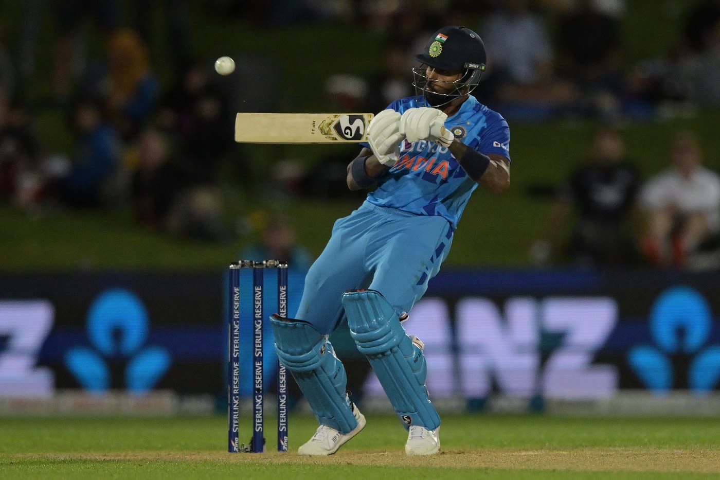 Hardik Pandya ramps the ball for a boundary to deep third ...