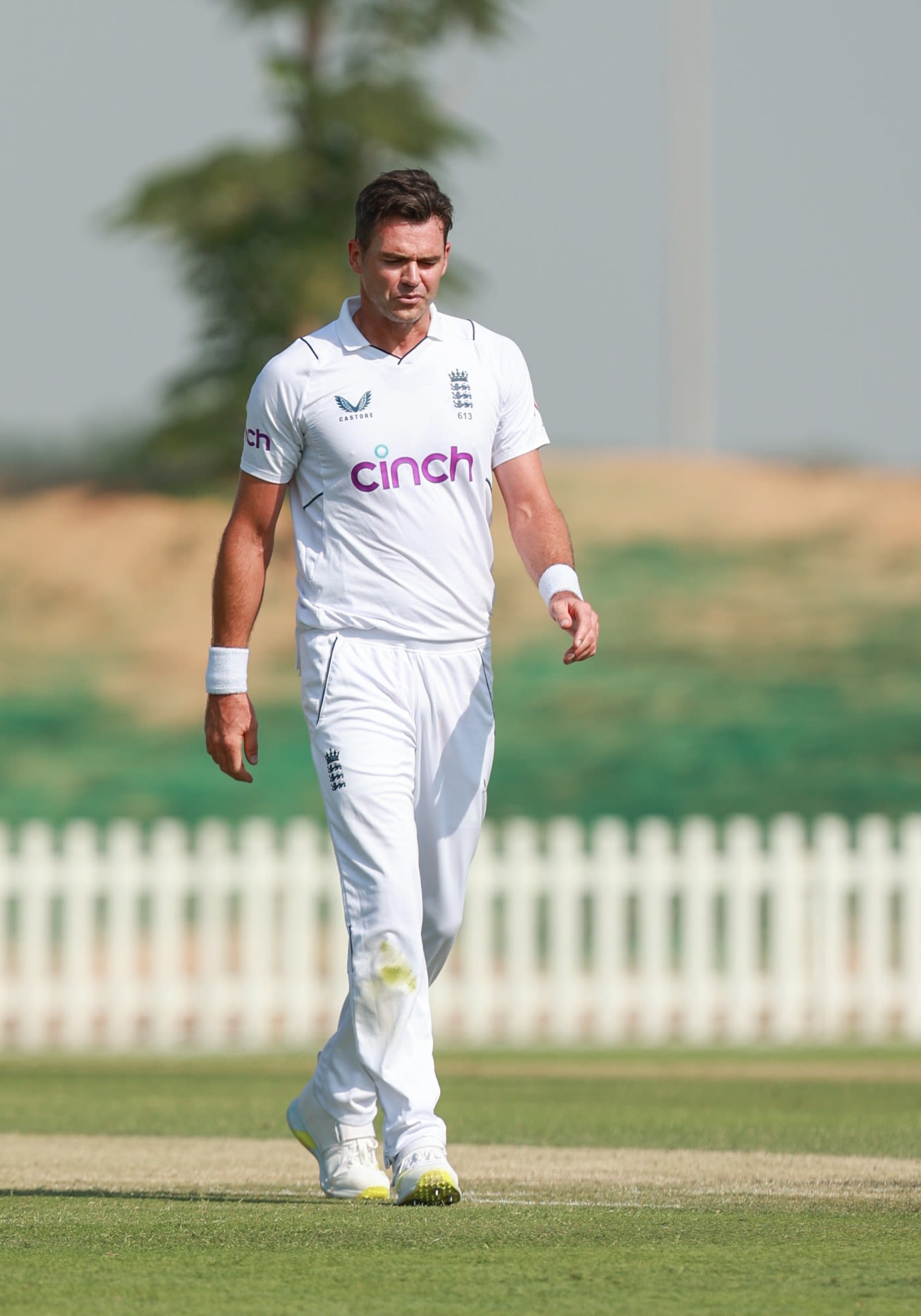 James Anderson walks back to his mark during England's warm-up in Abu ...