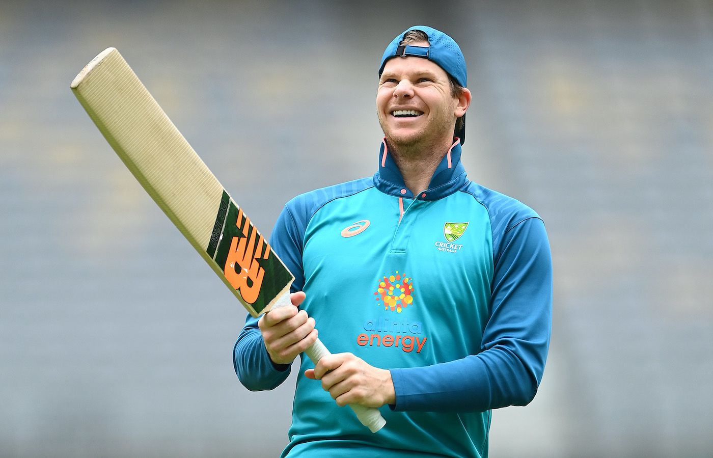 A happy Steve Smith wields a bat during practice | ESPNcricinfo.com